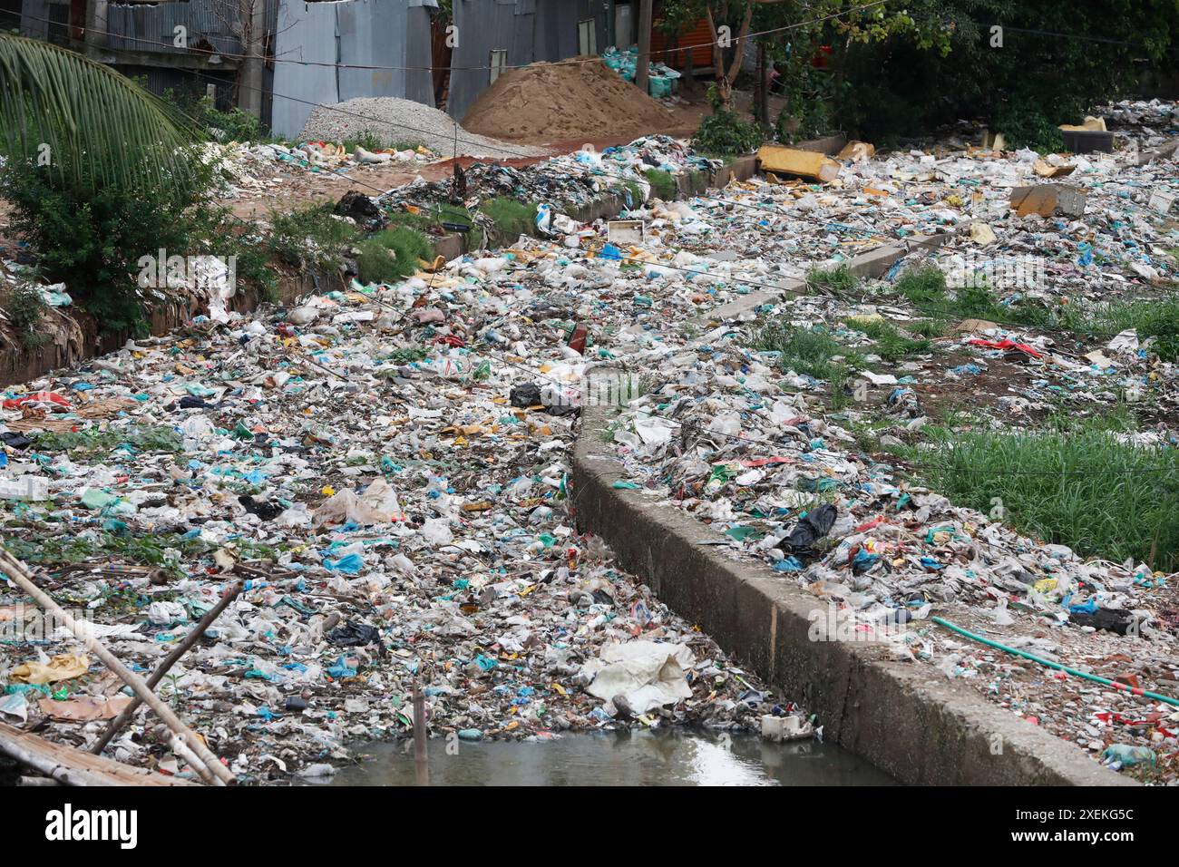 Dhaka, Bangladesh - June 28, 2024: Wastage plastic material and toxic ...