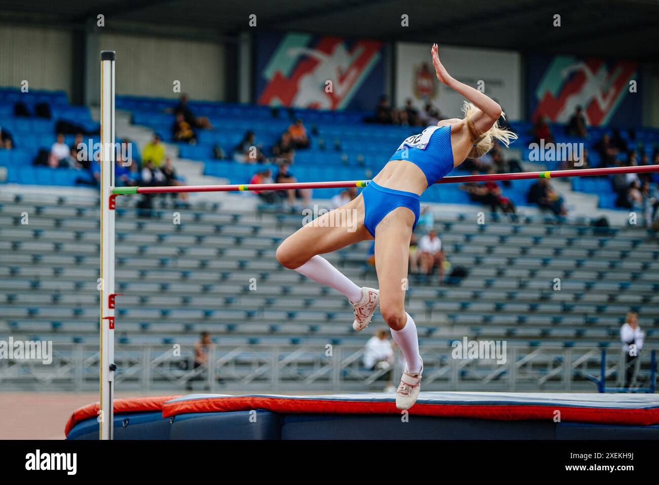woman athlete high jump at summer athletics games Stock Photo - Alamy