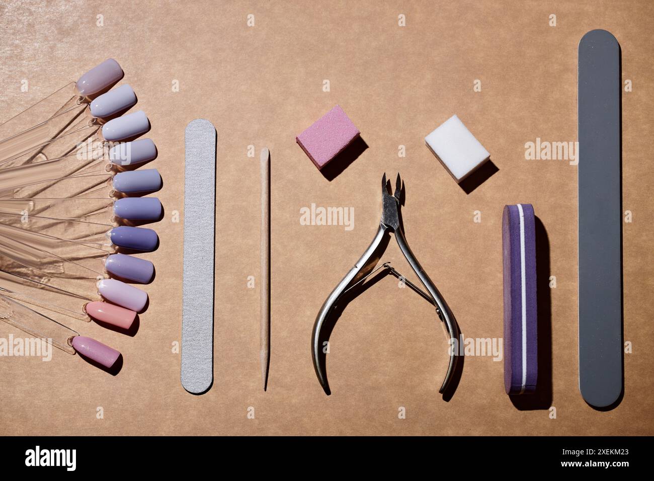 Flat lay shot of manicure tools set of straight nail files, wooden ...