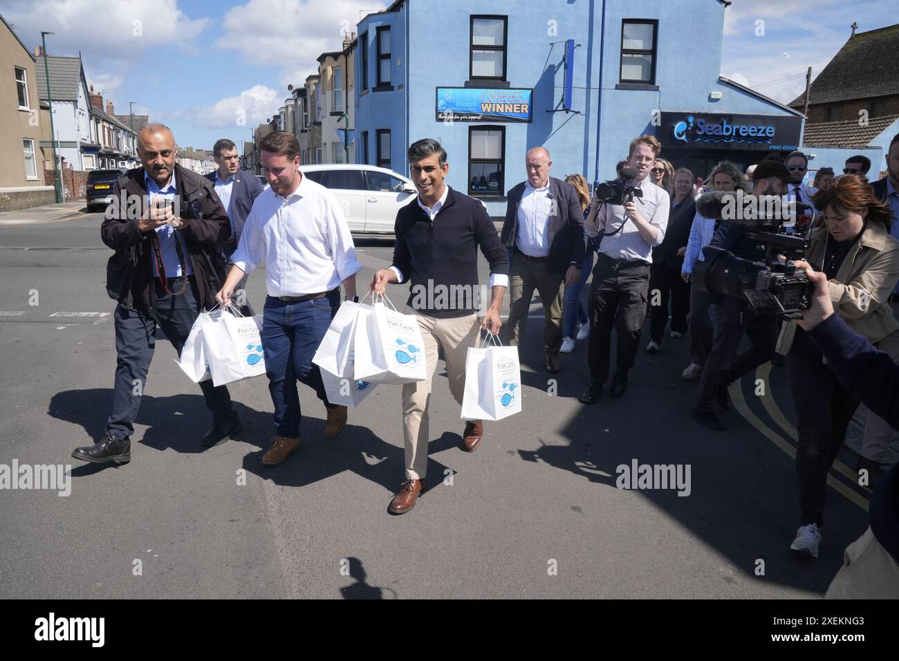 Prime Minister Rishi Sunak buys traditional fish and chips for the ...