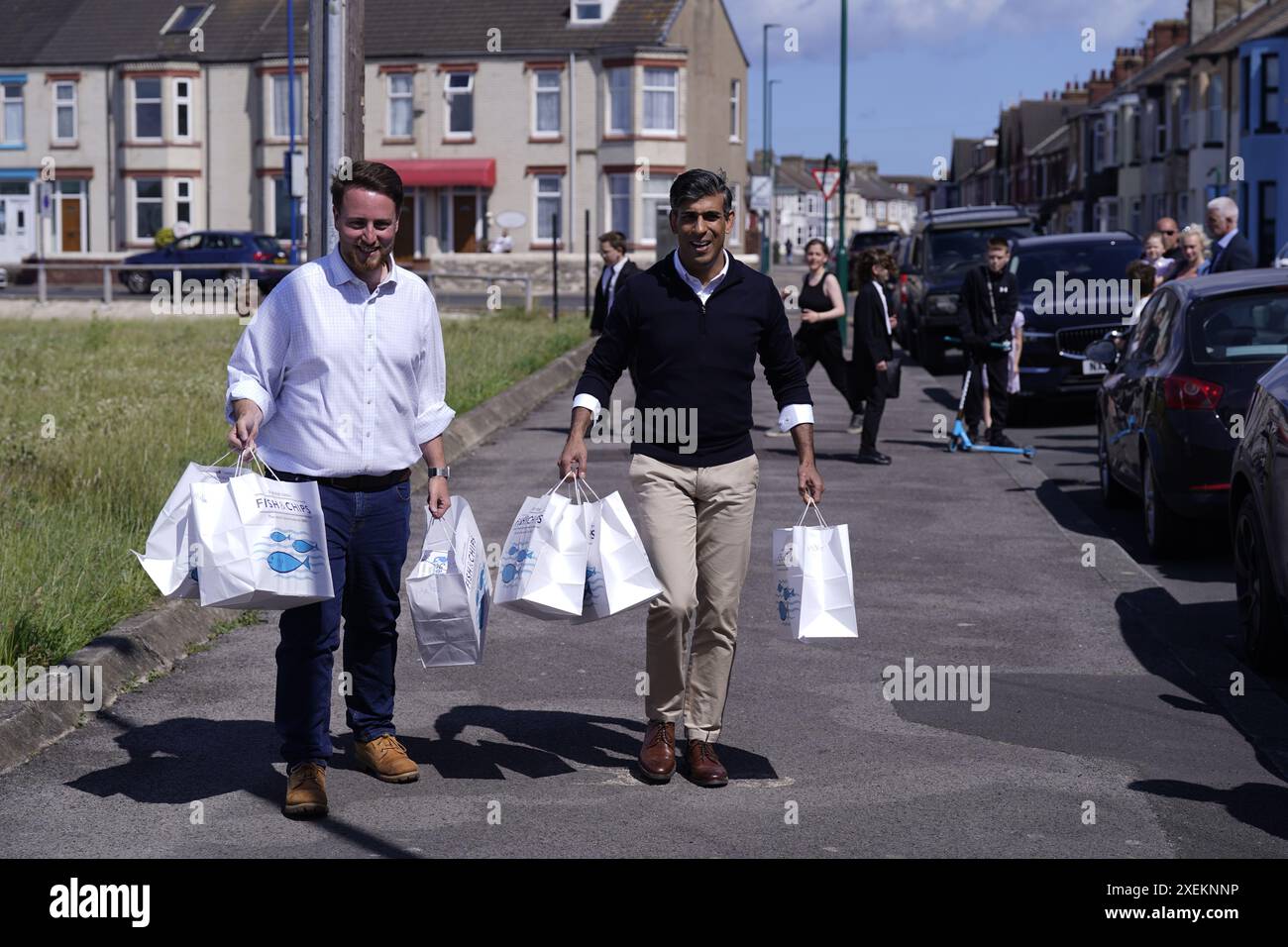 Prime Minister Rishi Sunak buys traditional fish and chips for the ...