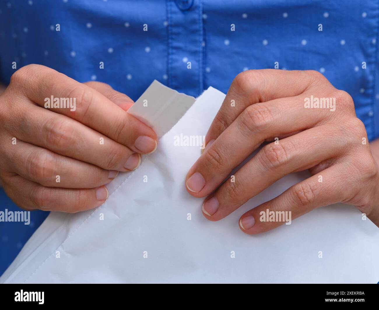 Tearing paper woman hi-res stock photography and images - Alamy