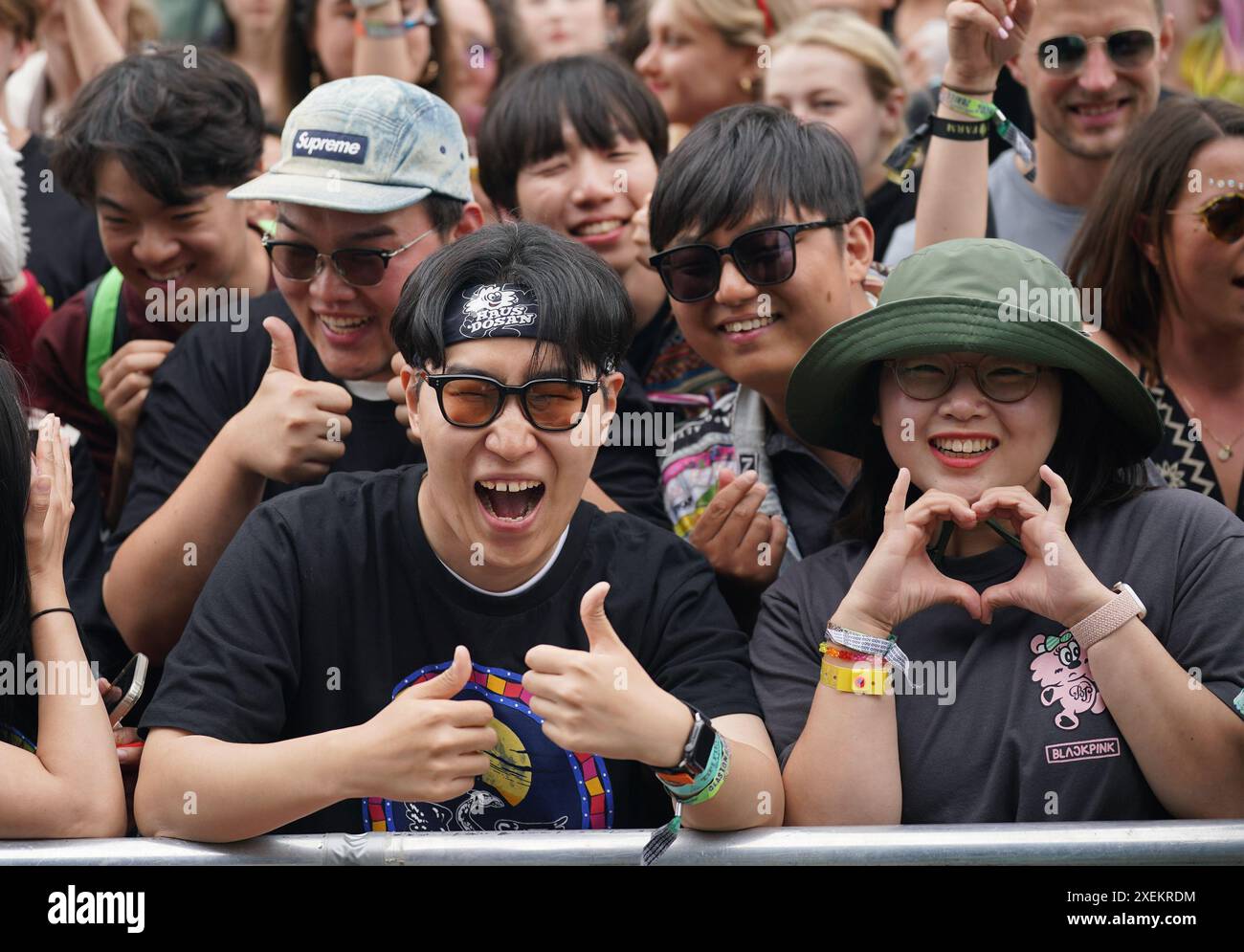 Fans of the South Korean K-pop band Seventeen in the crowd before their ...