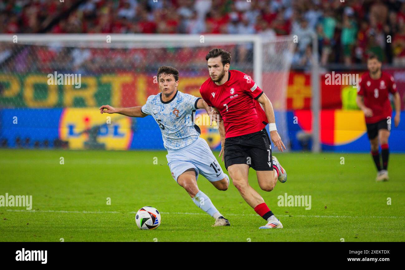 Gelsenkirchen, Germany. 26th Jun 2024. Khvicha Kvaratskhelia (GEO) Joao ...