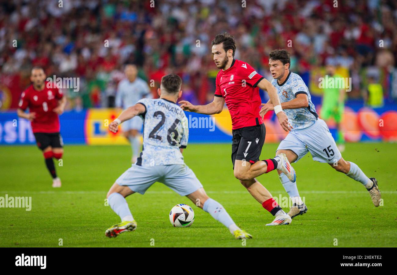 Gelsenkirchen, Germany. 26th Jun 2024. Khvicha Kvaratskhelia (GEO) Joao ...