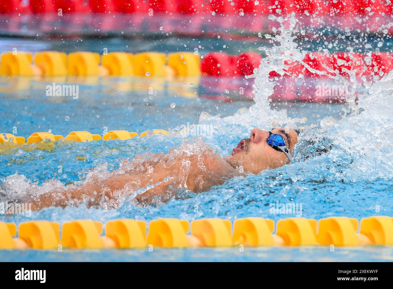 Thomas Ceccon of Italy competes in the 100m Backstroke Men Final during ...