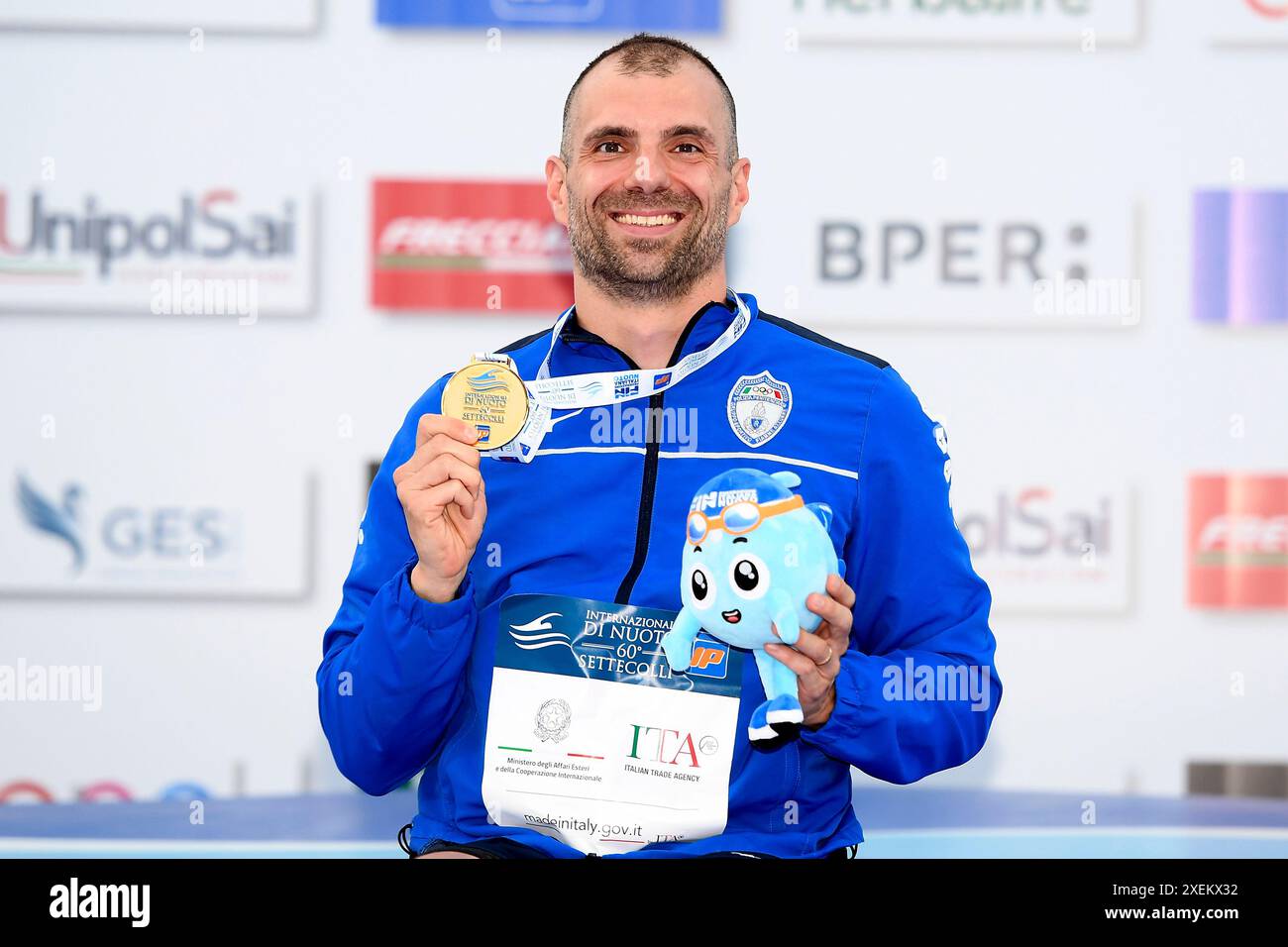 Simone Ciulli, gold, shows the medals after competing in the 50m ...