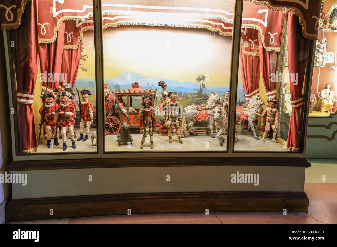 18th & 19th century vintage puppets on display in a cabinet inside the ...