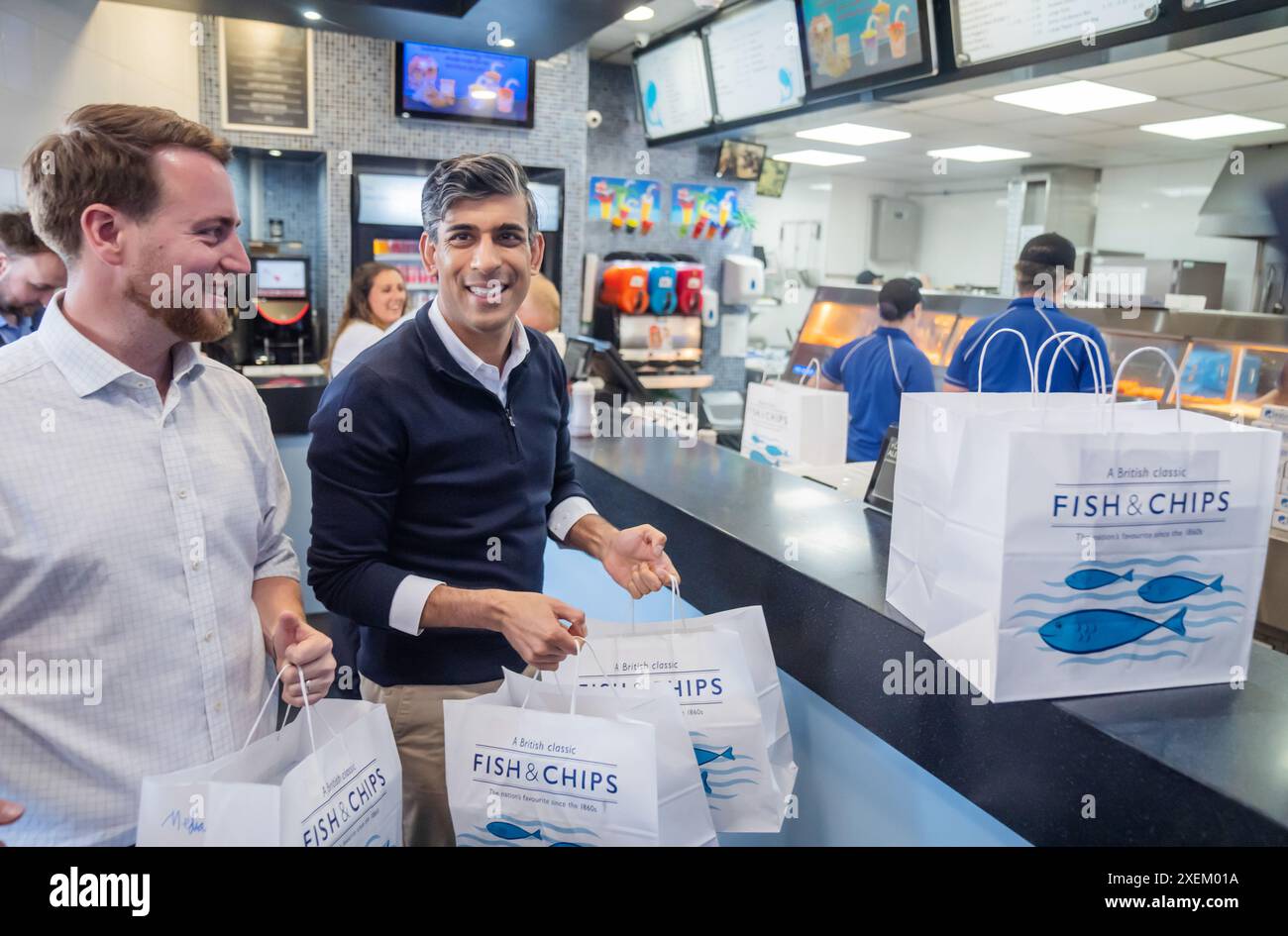 Prime Minister Rishi Sunak buys traditional fish and chips for the ...