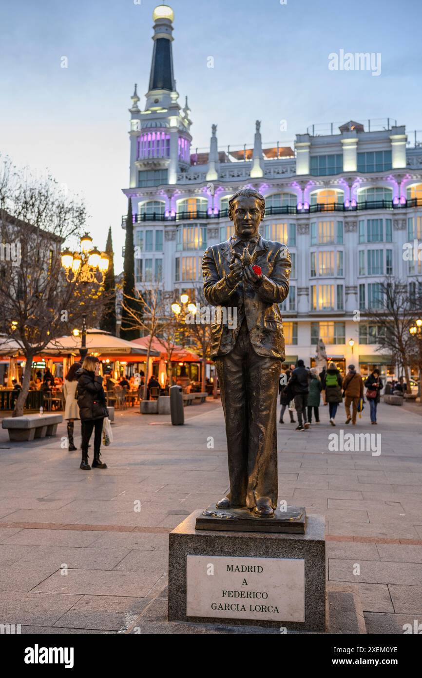 Statue of Federico Garcia Lorca in the Plaza de Santa Ana, at night ...
