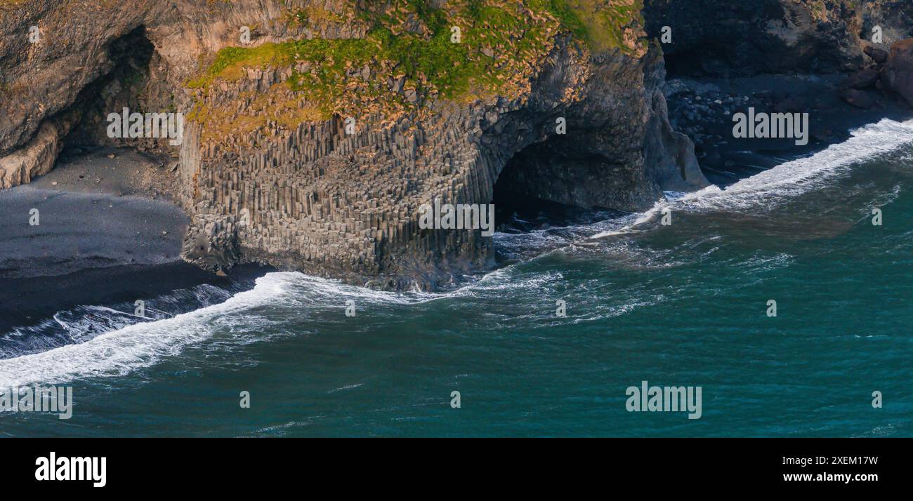 Aerial View of Black Sand Beach and Basalt Column Cave in Iceland Stock ...