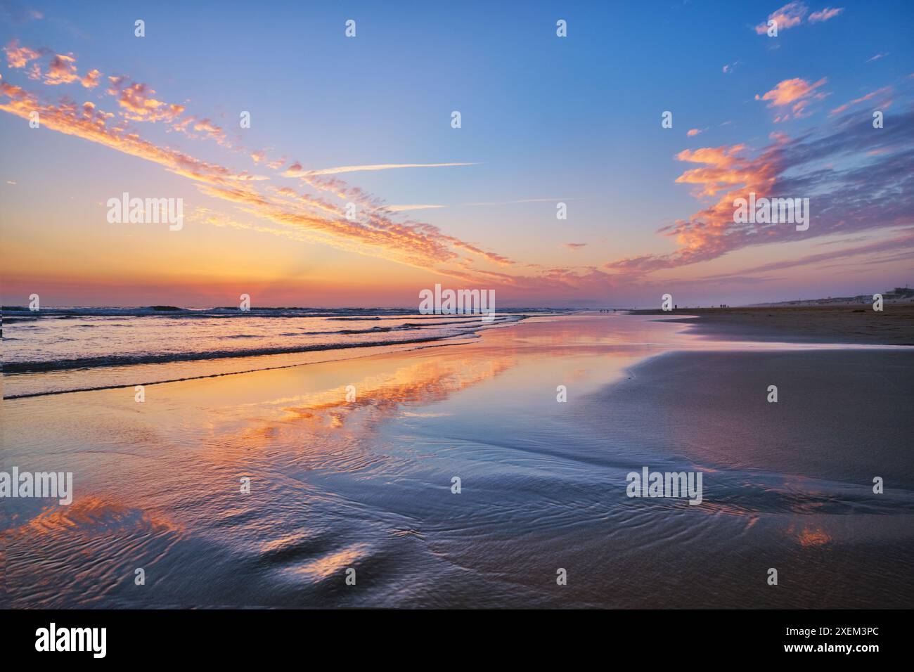 Atlantic ocean sunset with surging waves at Fonte da Telha beach ...