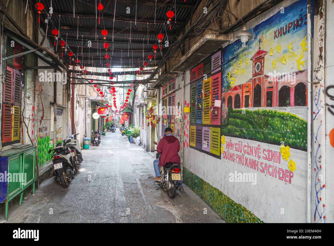 Ho Chi Minh City, Vietnam - 1 Feb, 2024: Scooters in a back street ...