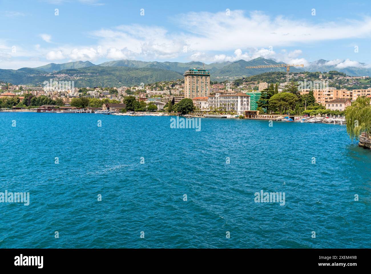 View on Lugano city from the lake of Lugano in summer day, Ticino ...