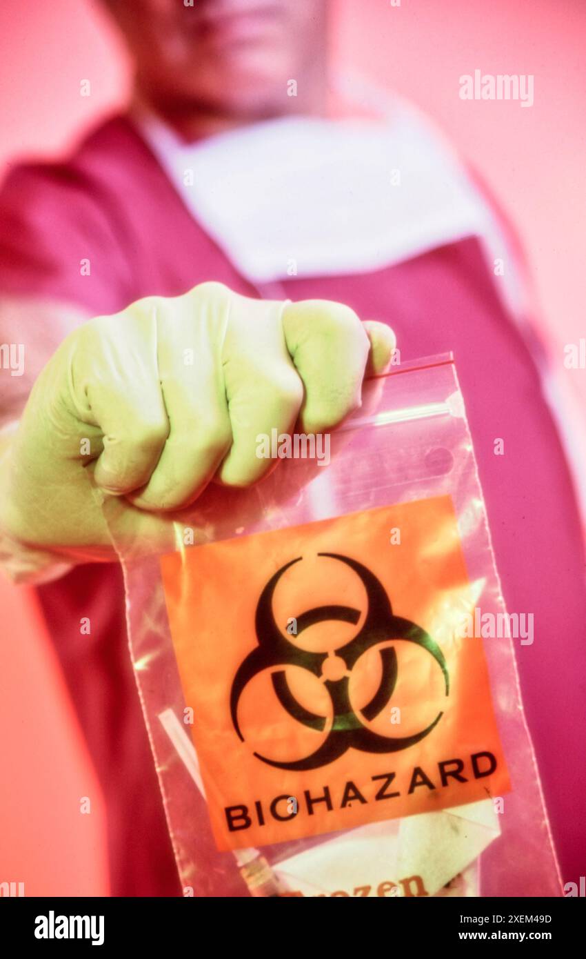 Close up of technician holding biohazard medical waste bag, USA Stock ...