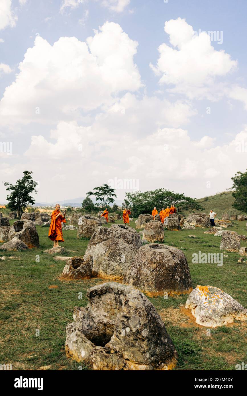 Monks sightseeing at the archaeological world heritage site Plain of ...
