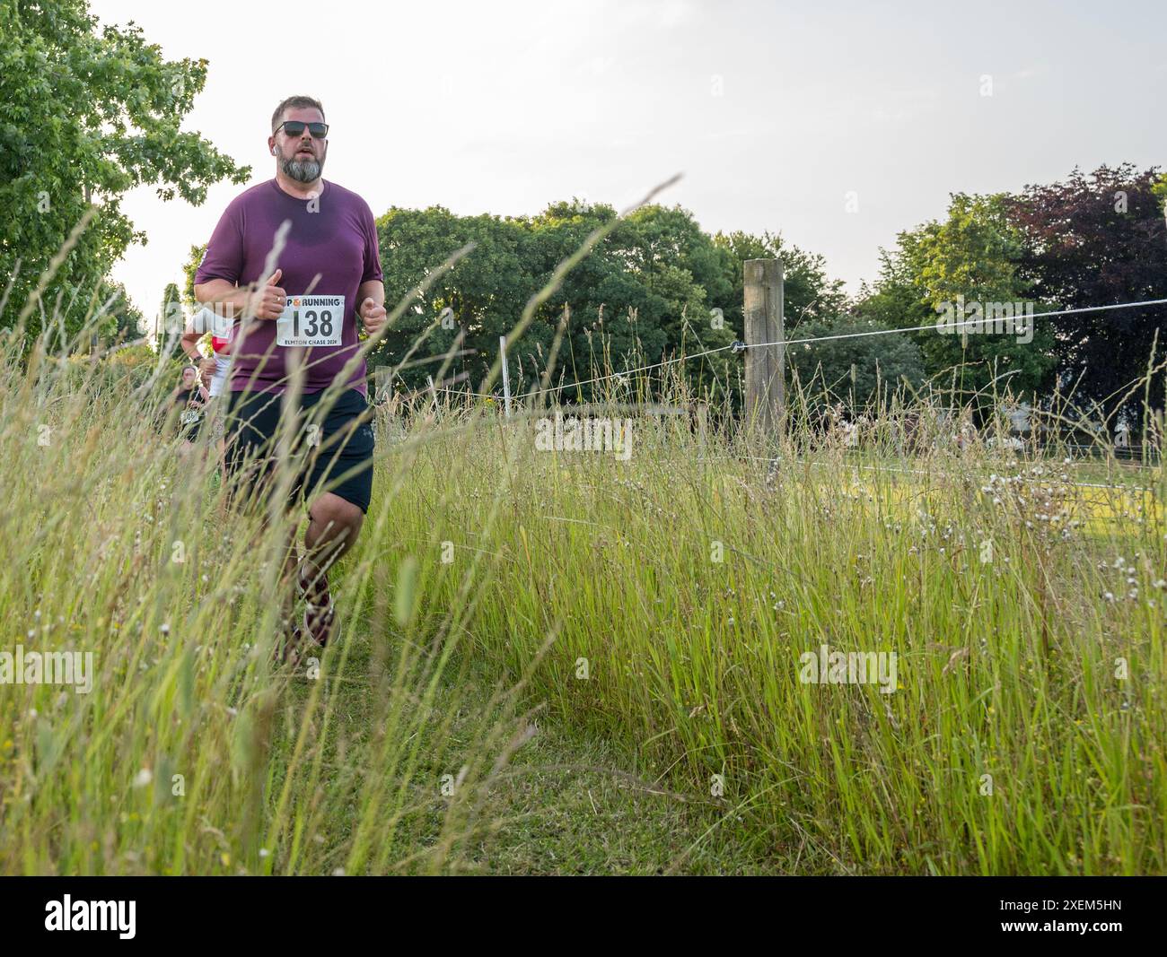 Adult runners taking part in the 5 mile cross country Elmton Chase in ...