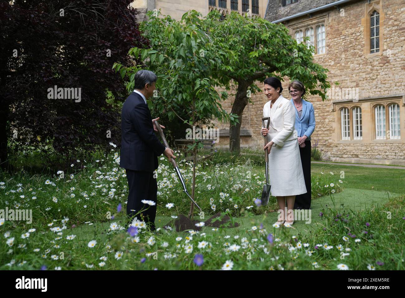 Emperor Naruhito of Japan and his wife Empress Masako plant a cherry ...
