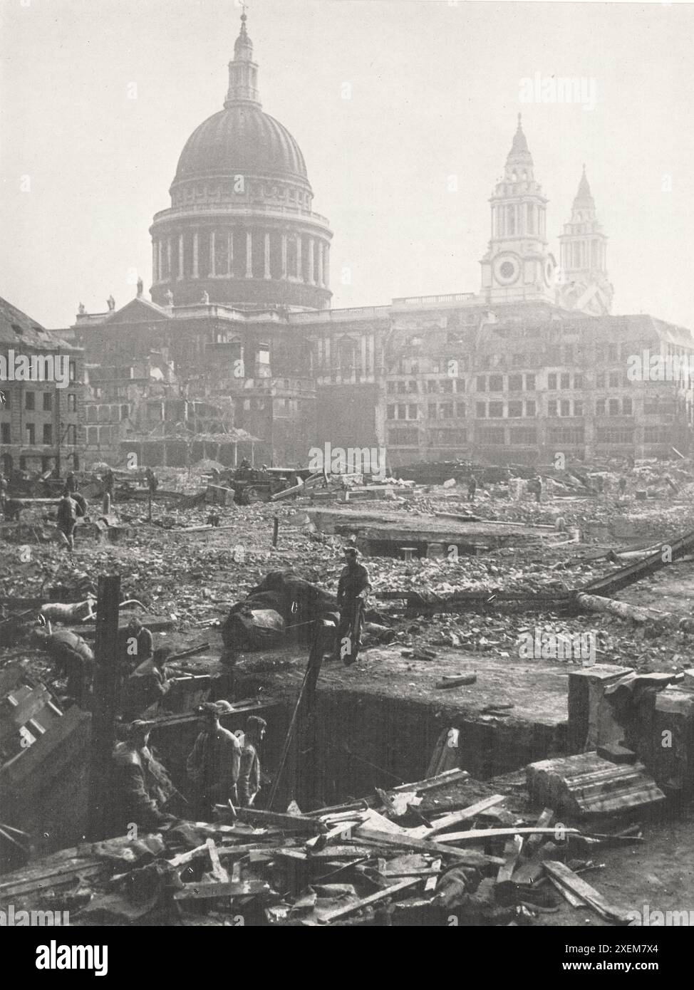 City of London Blitz bomb damage. Sappers in building basements in ...