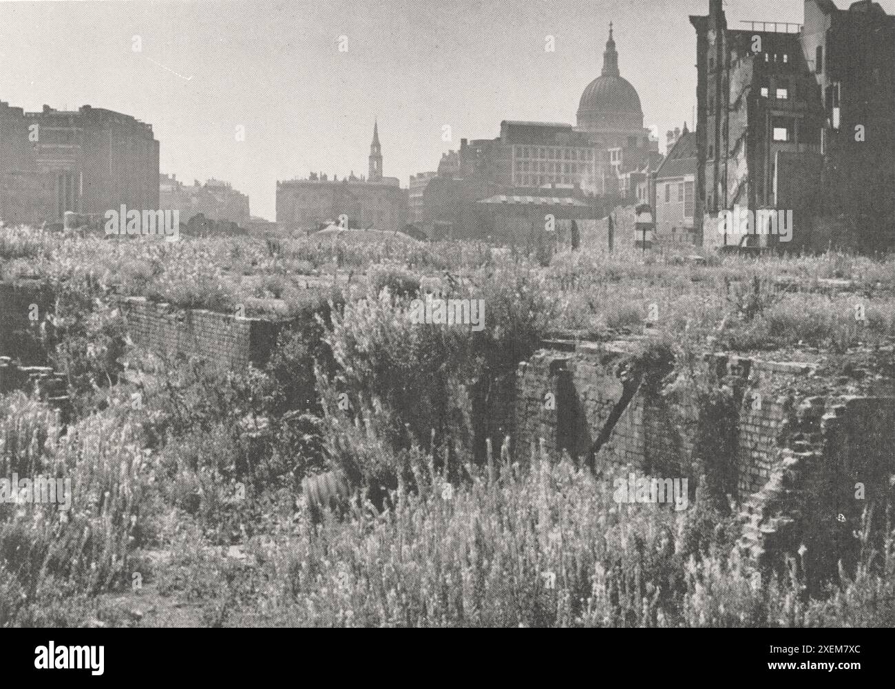 City of London Blitz bomb damage. A ground level view with the spire of ...
