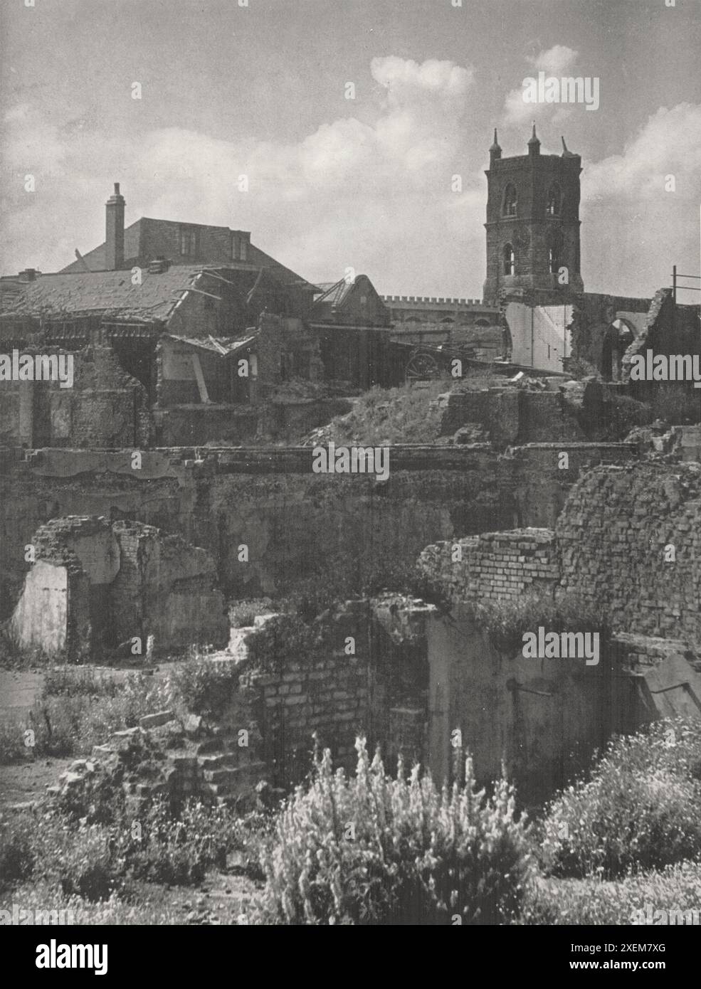 City of London Blitz bomb damage. The battered tower of St Giles ...