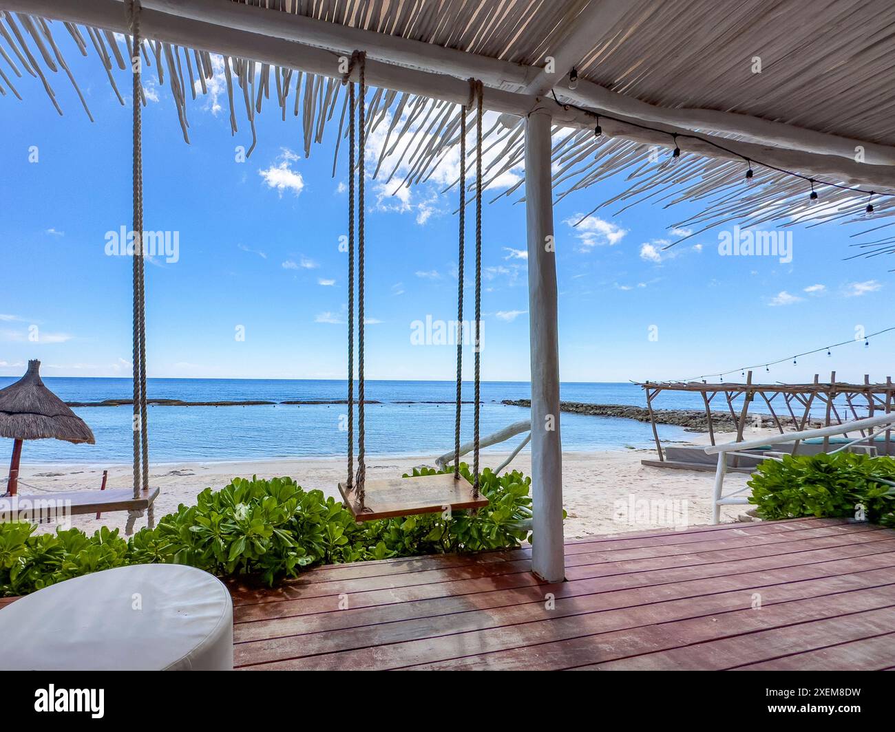 Escape to a secluded wooden beach bar on pristine white sand, where ...