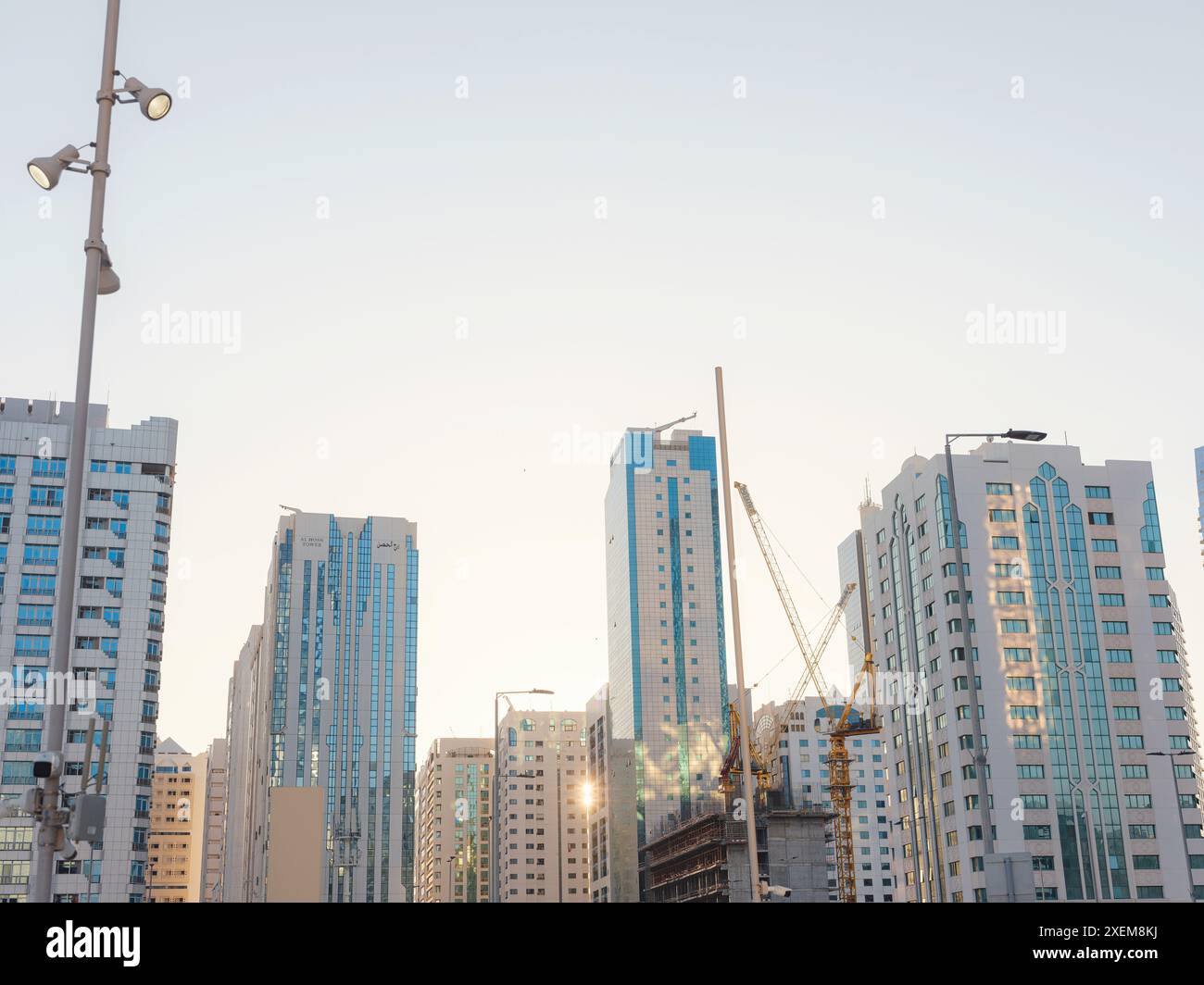 A city skyline in Abu Dhabi with a modern-looking park. modern Qasr al ...