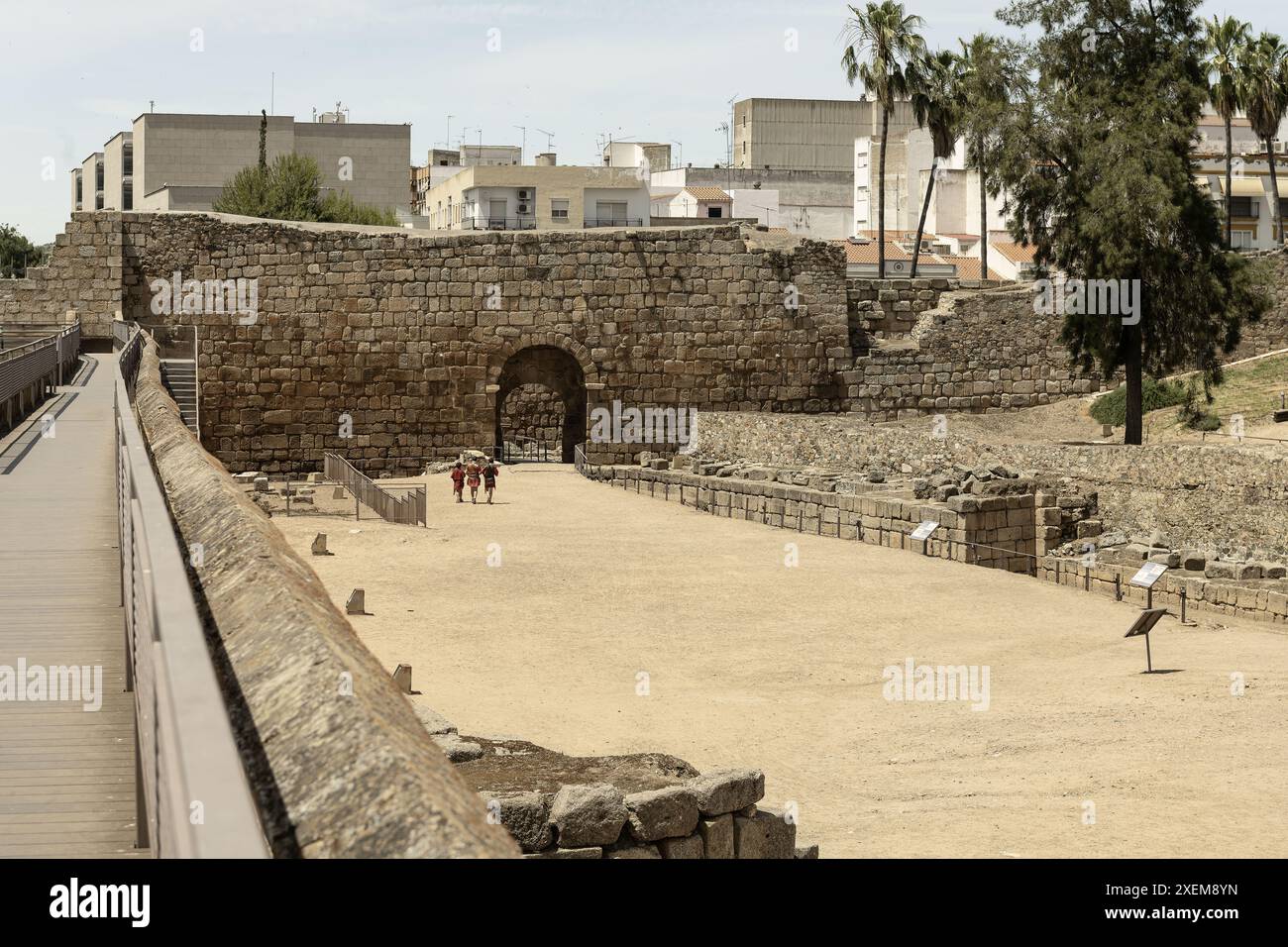 The towering stone walls of the Alcazaba in Merida, Spain, bathed in ...