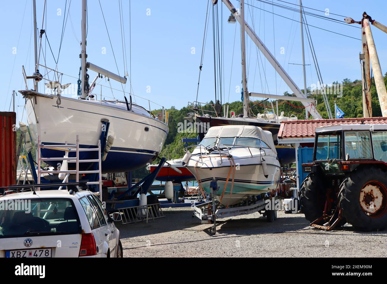 Boats at a boat yard in Hamburgsund Village on the western coastline of ...