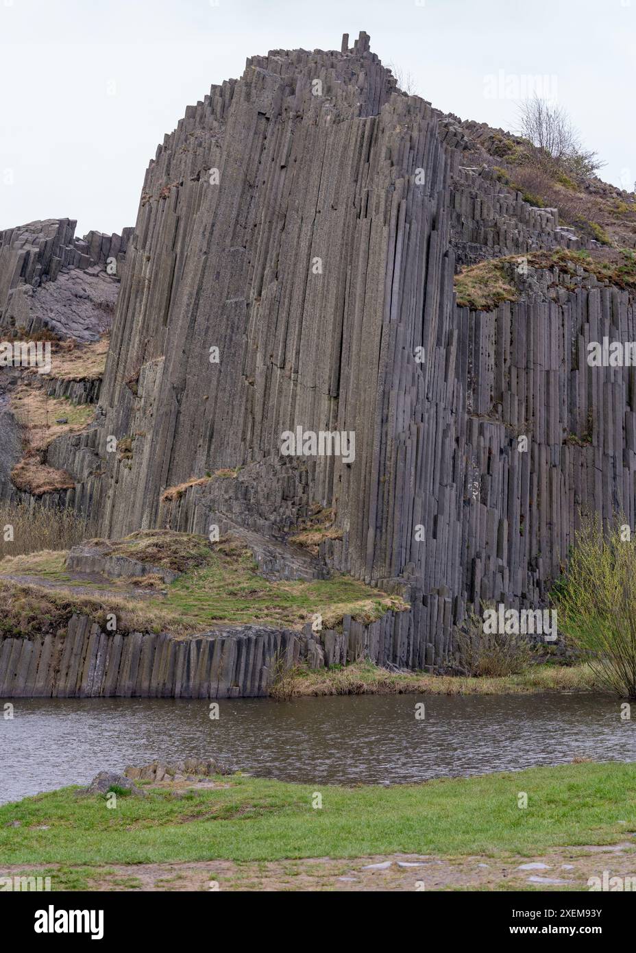 Tall and gray basalt columns. Basalt rock Panska Skala in Kamenice ...