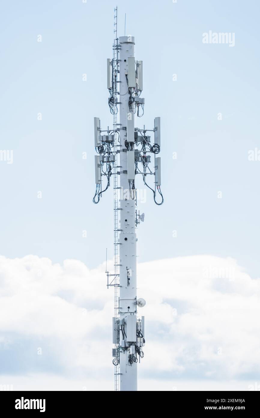 Cell phone tower standing tall for telecommunications with antenna in ...