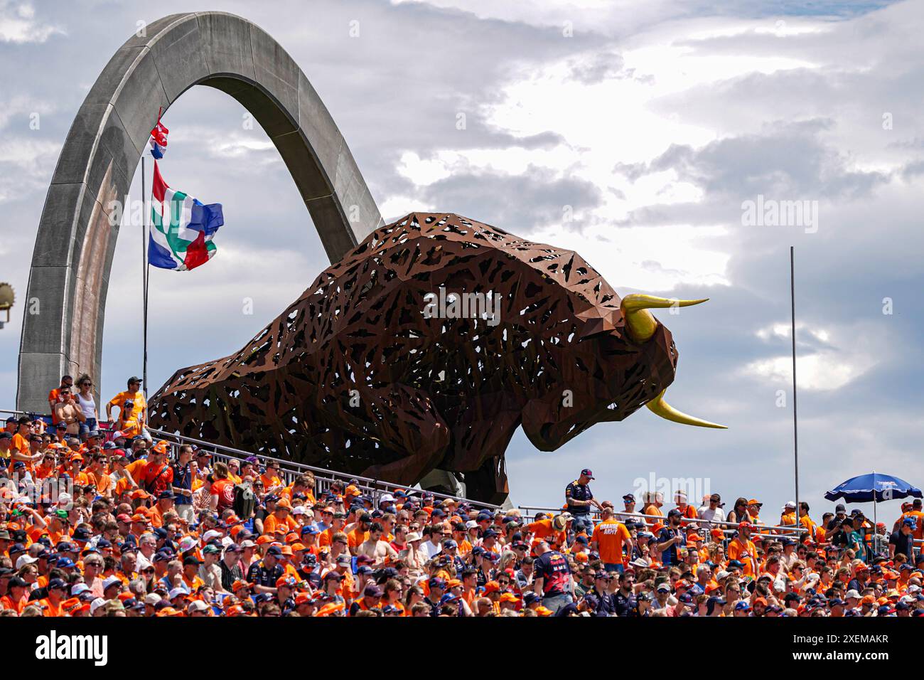 "RED BULL" over the grand stand - metallic bull statue, atmosphere ...
