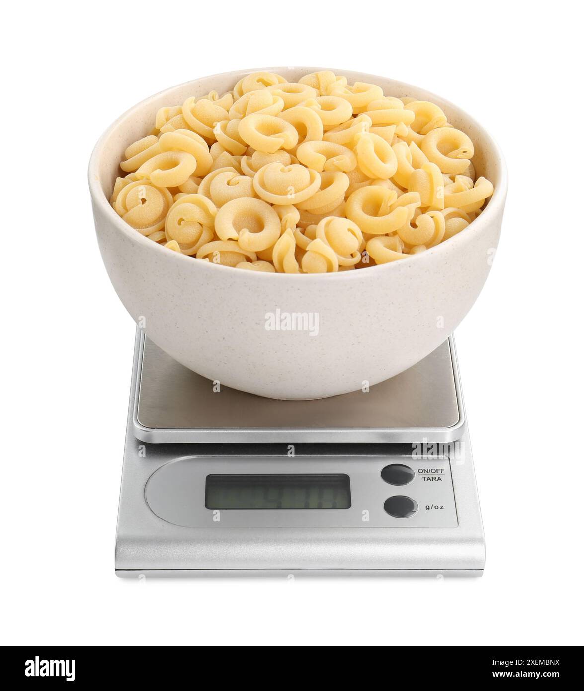 Kitchen scale with bowl of pasta isolated on white Stock Photo - Alamy