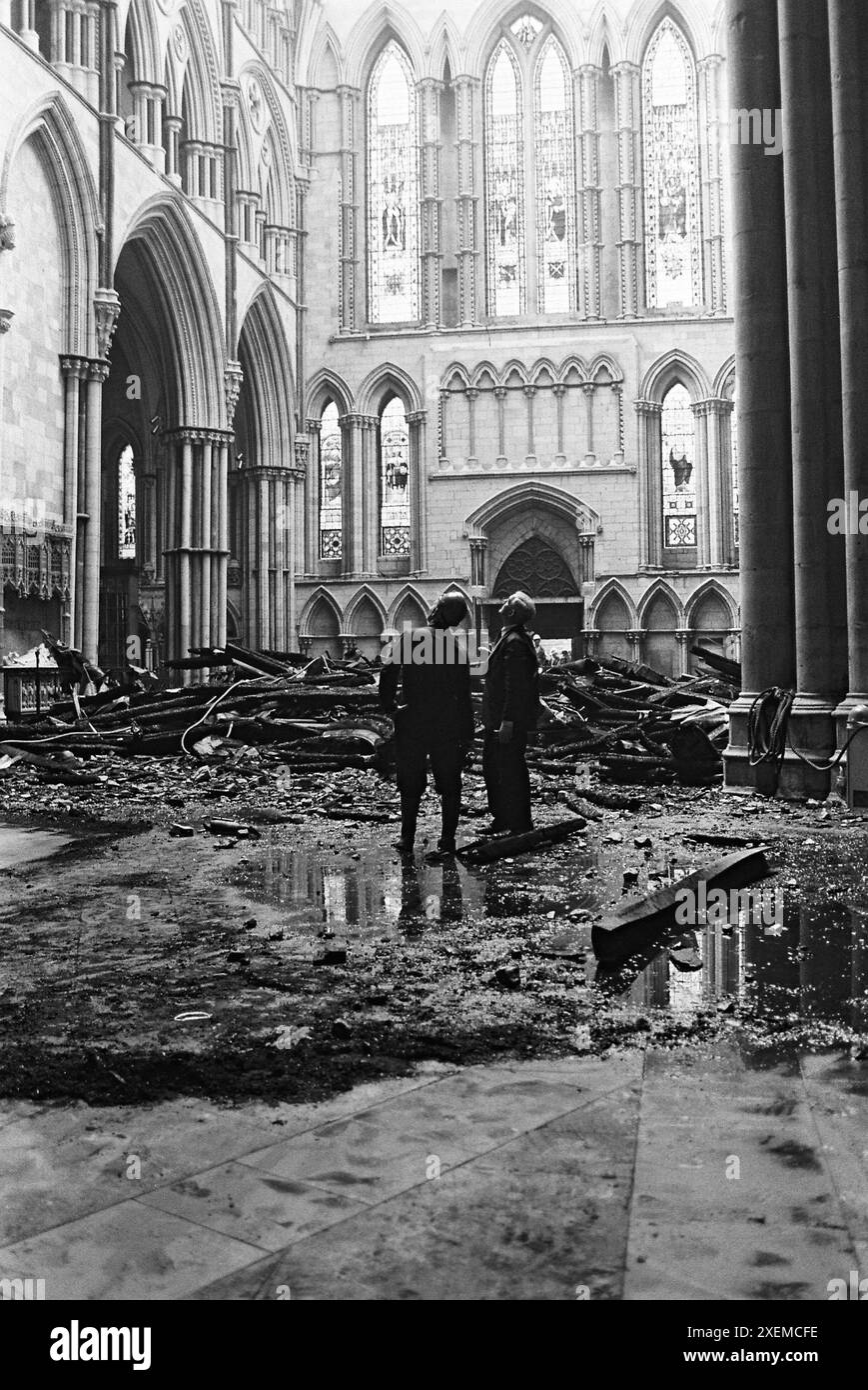 York, UK, 9th July 1984: Charred roof timbers cover the floor of York ...