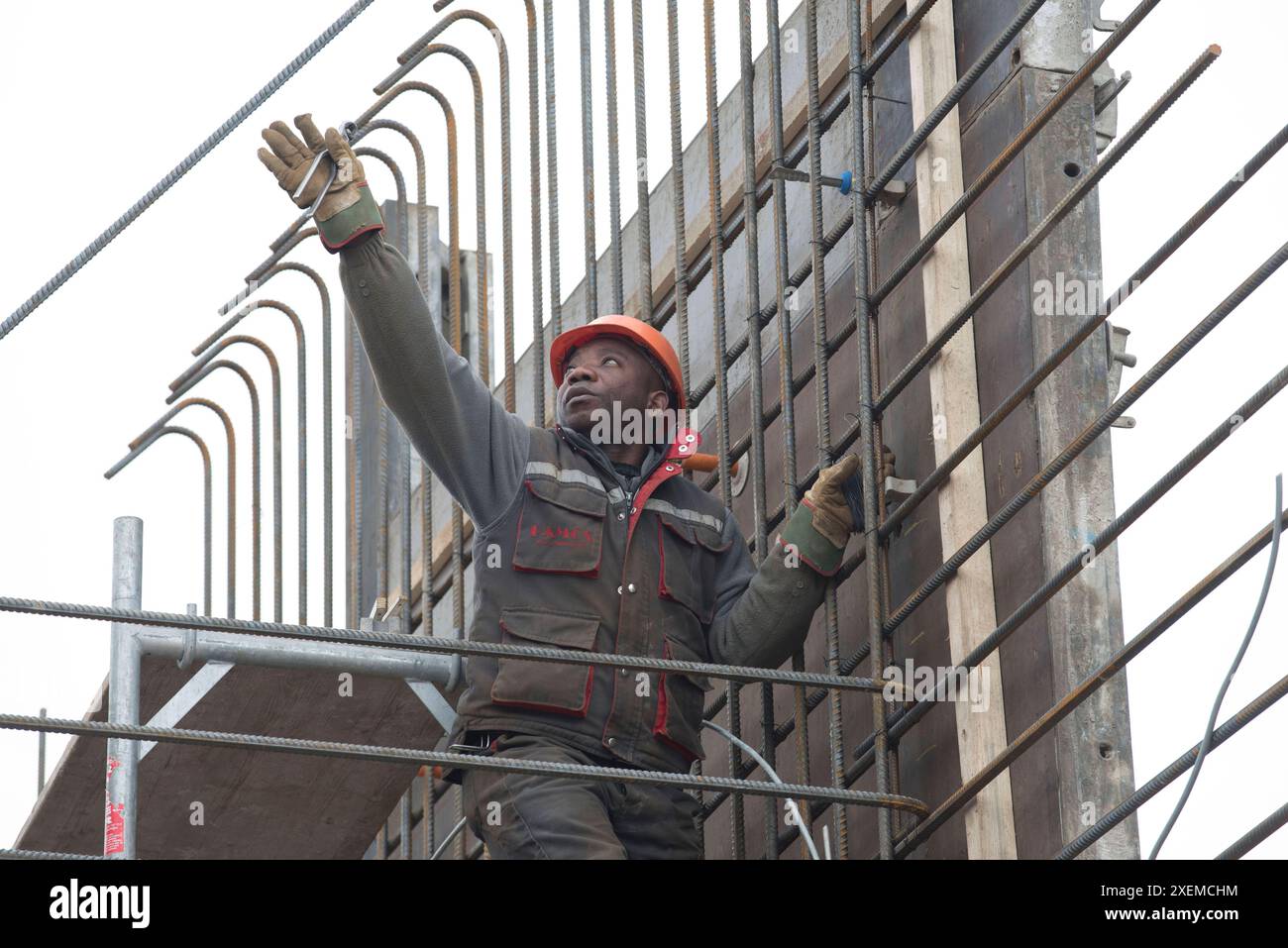 construction worker at a building site, employee in construction ...