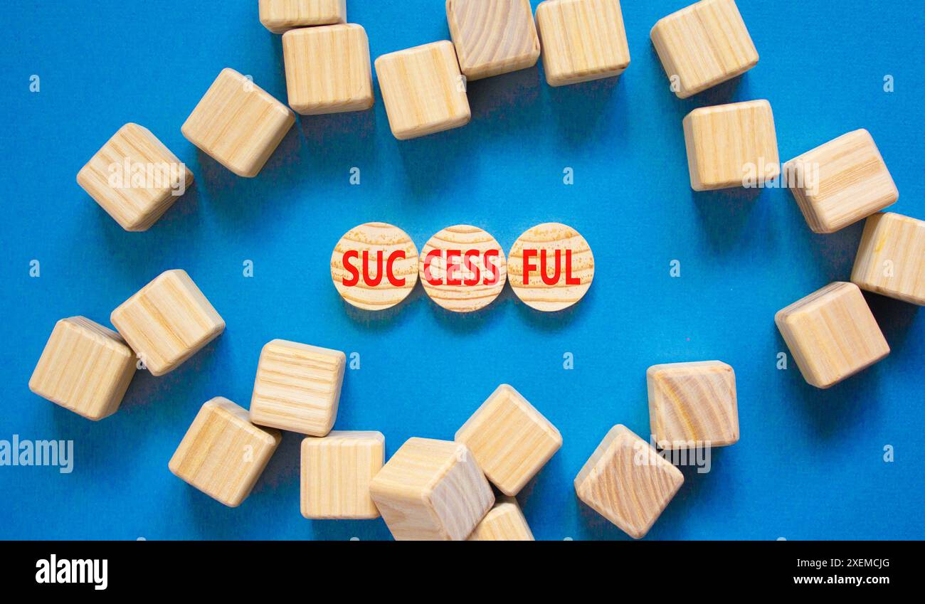 Successful symbol. Concept word Successful on beautiful wooden circles ...