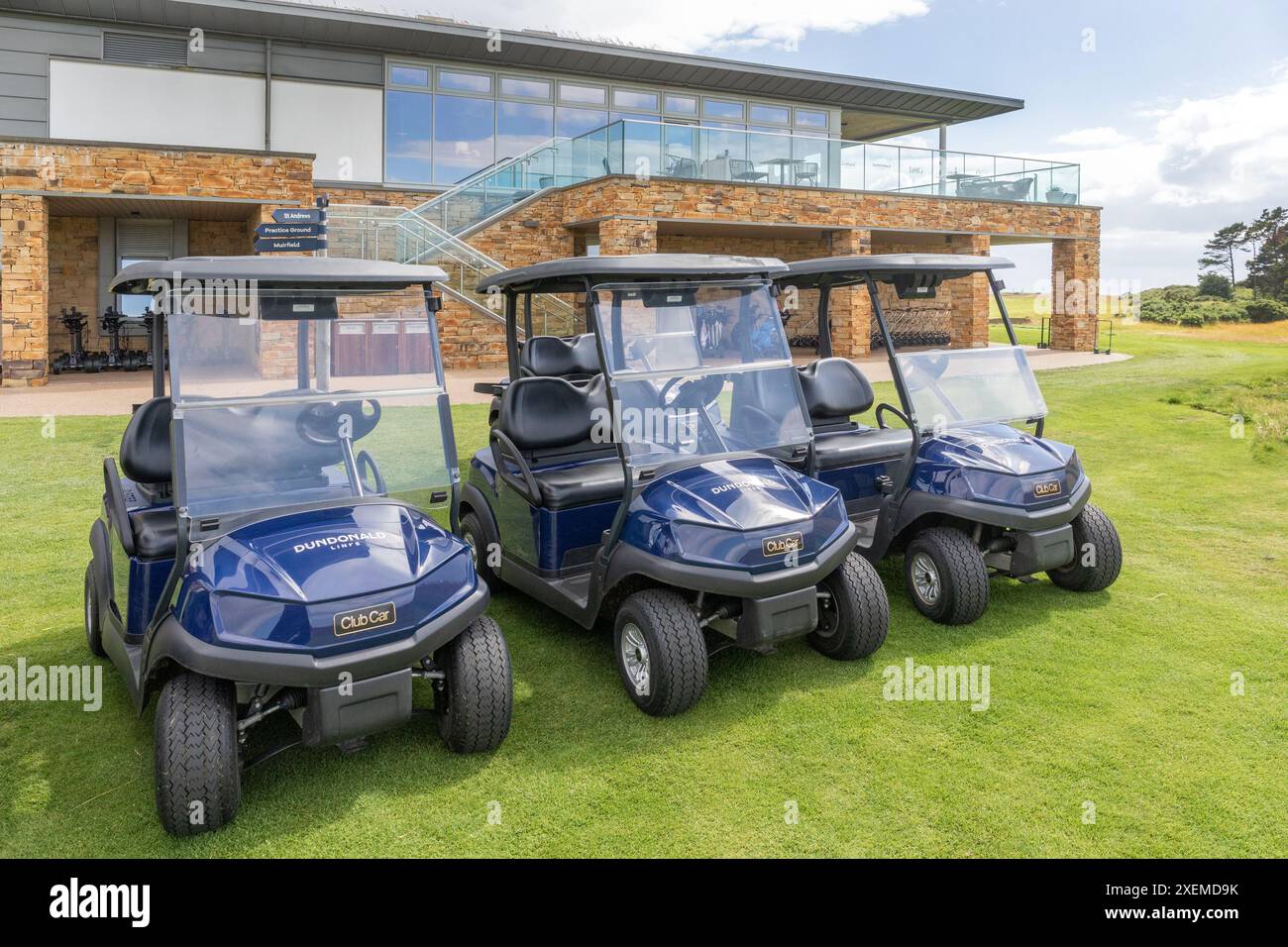 Golf buggies parked outside the clubhouse and restaurant at Dundonald ...