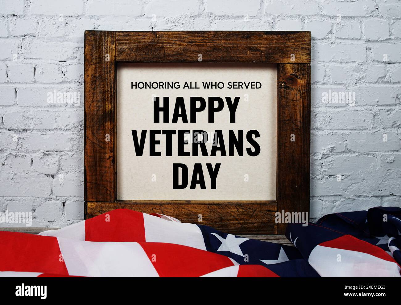 Happy Veterans Day alphabet letter and American flag on wooden ...