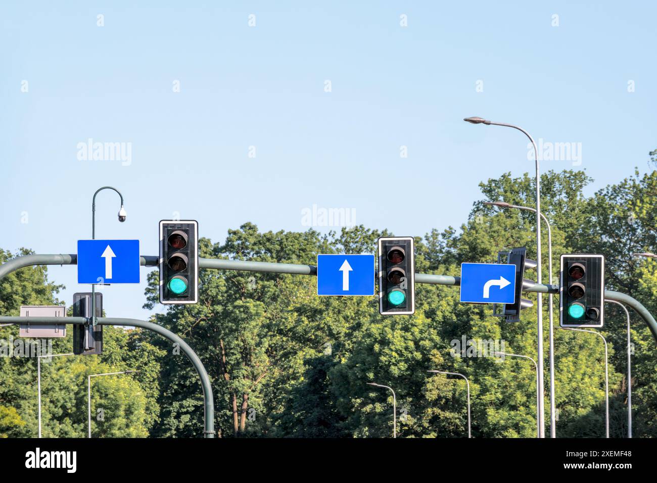 Road signs and traffic lights on a metal frame Stock Photo - Alamy