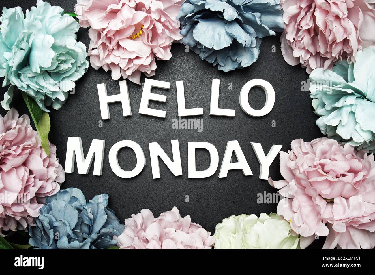 Hello Monday alphabet letter with flower decoration on black background ...