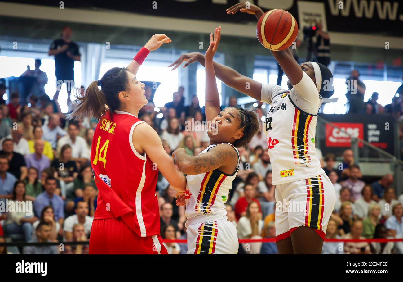 Kortrijk, Belgium. 28th June, 2024. China's Sun Mengran, Belgium's ...