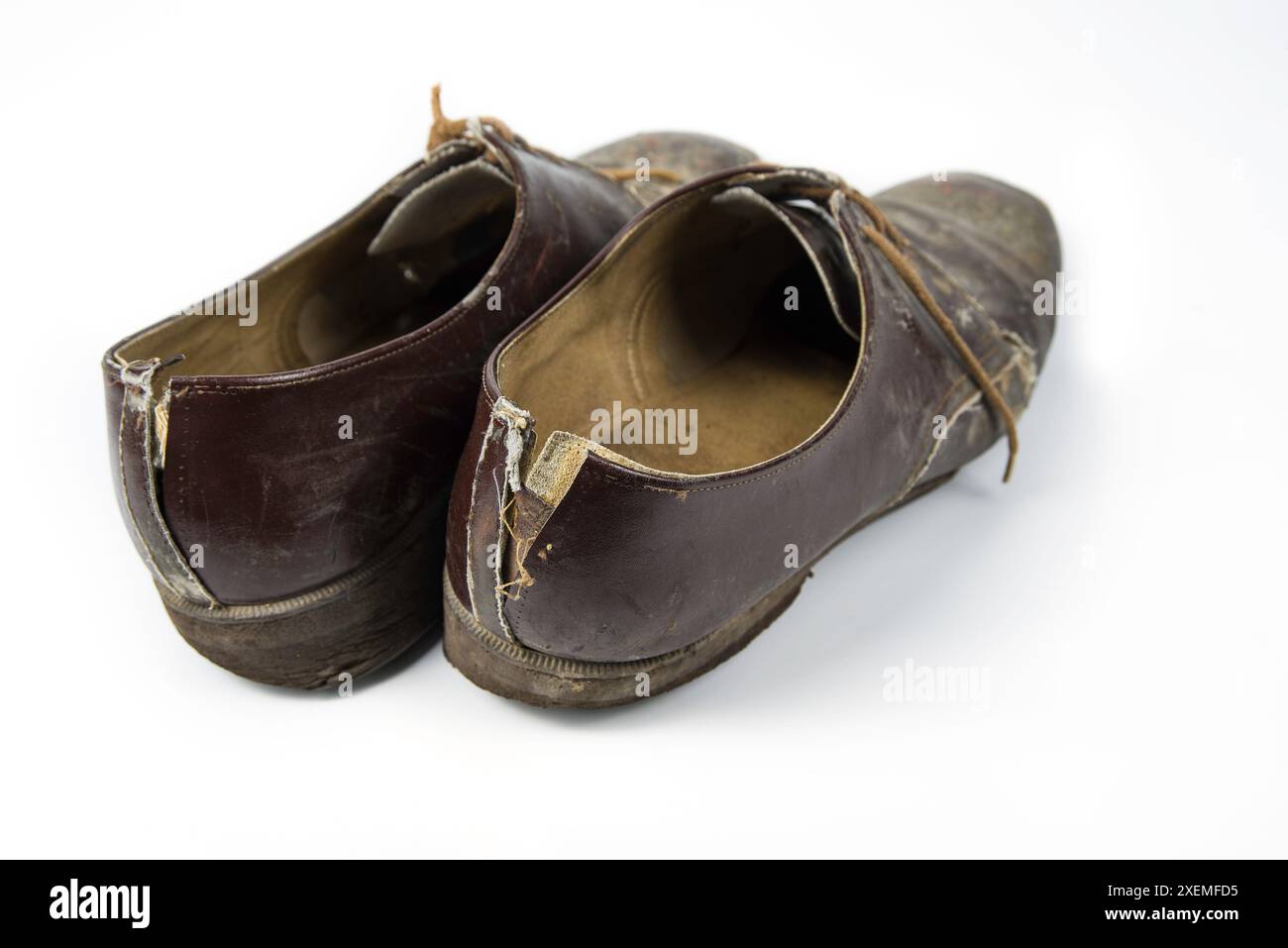 Ruined casual businness shoes used for work on a white background Stock ...