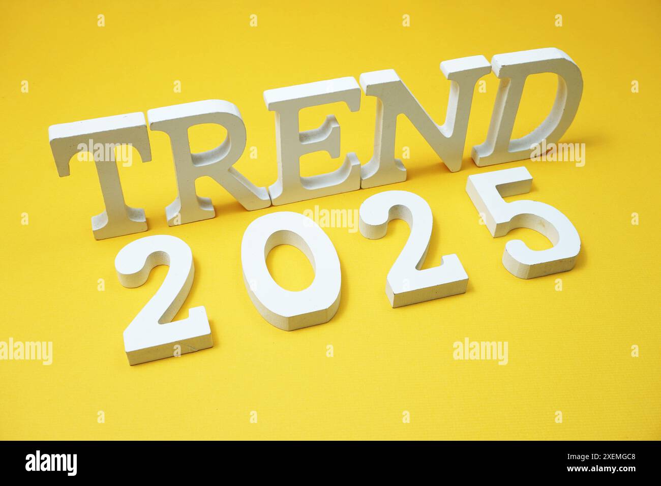 Trend 2025 alphabet letter on yellow background Stock Photo - Alamy