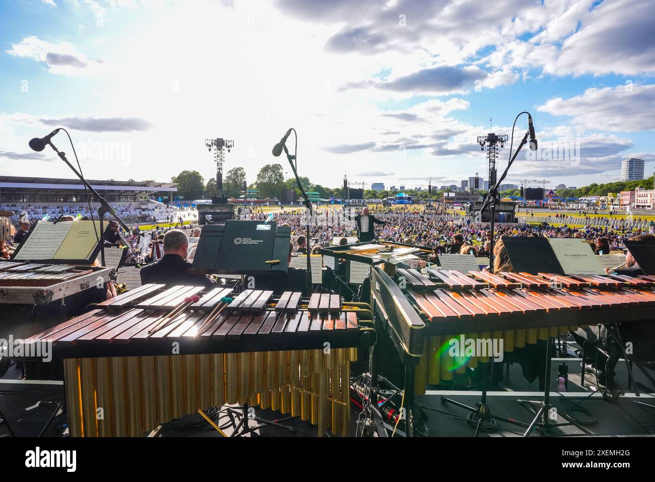 The royal philharmonic orchestra performing on stage at bst hyde park ...
