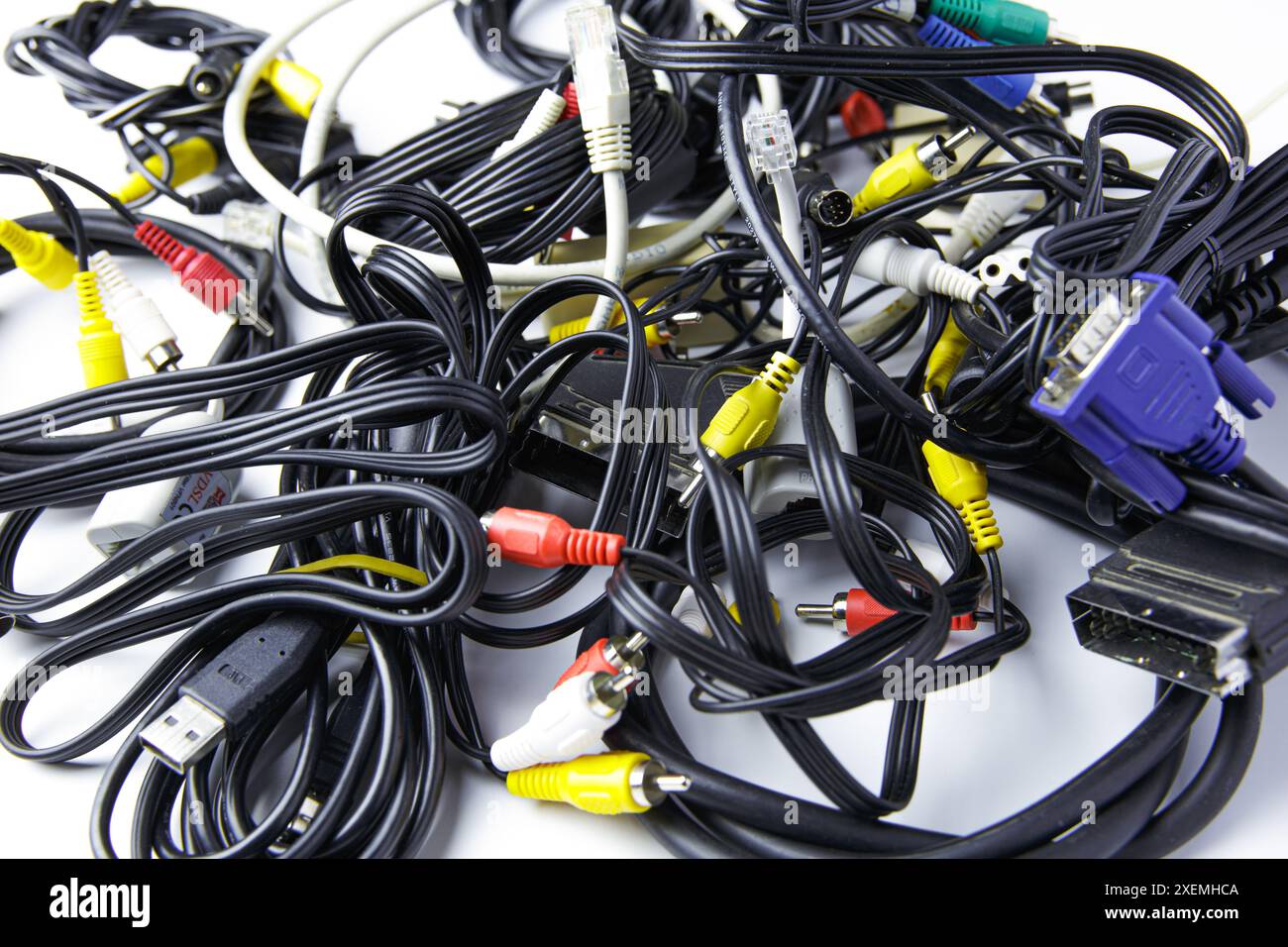 A bunch of wires and cords are tangled together. Concept of chaos and ...