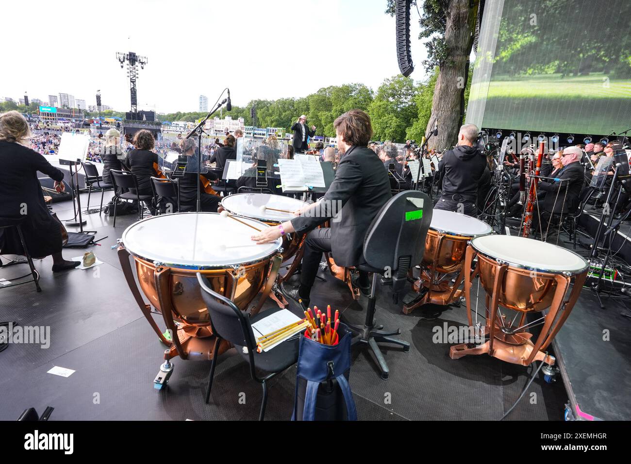 The royal philharmonic orchestra performing on stage at bst hyde park ...