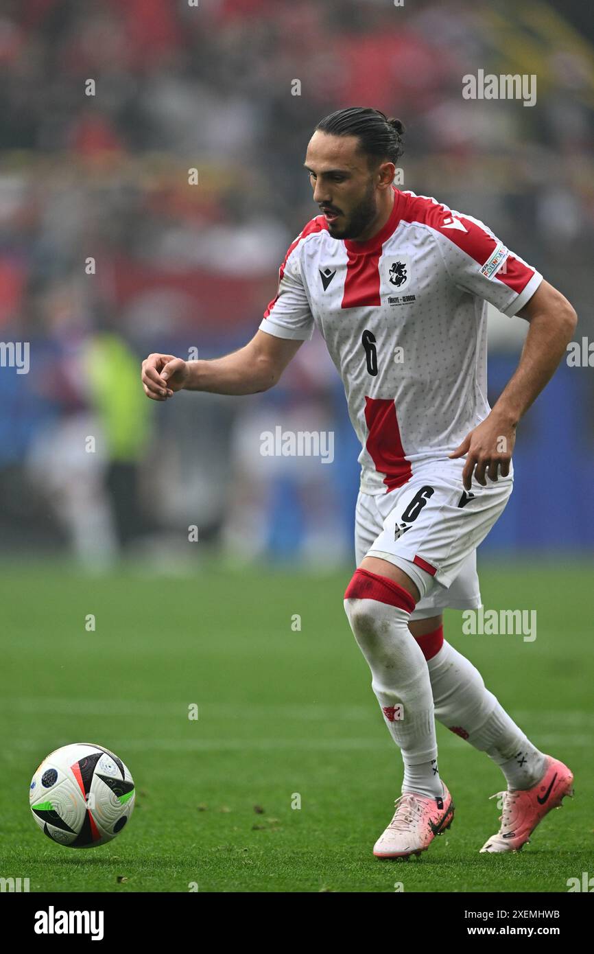 DORTMUND, GERMANY - JUNE 18: Giorgi Kochorashvili of Georgia controls ...
