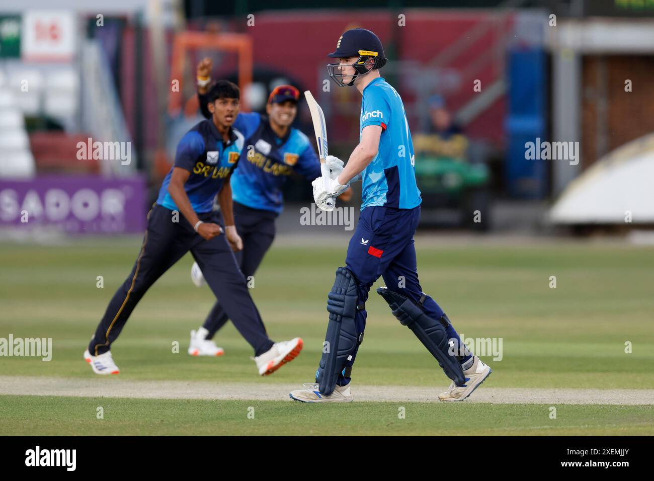Sri Lanka's Hivin Kenula takes the wicket of England's Rocky Flintoff ...