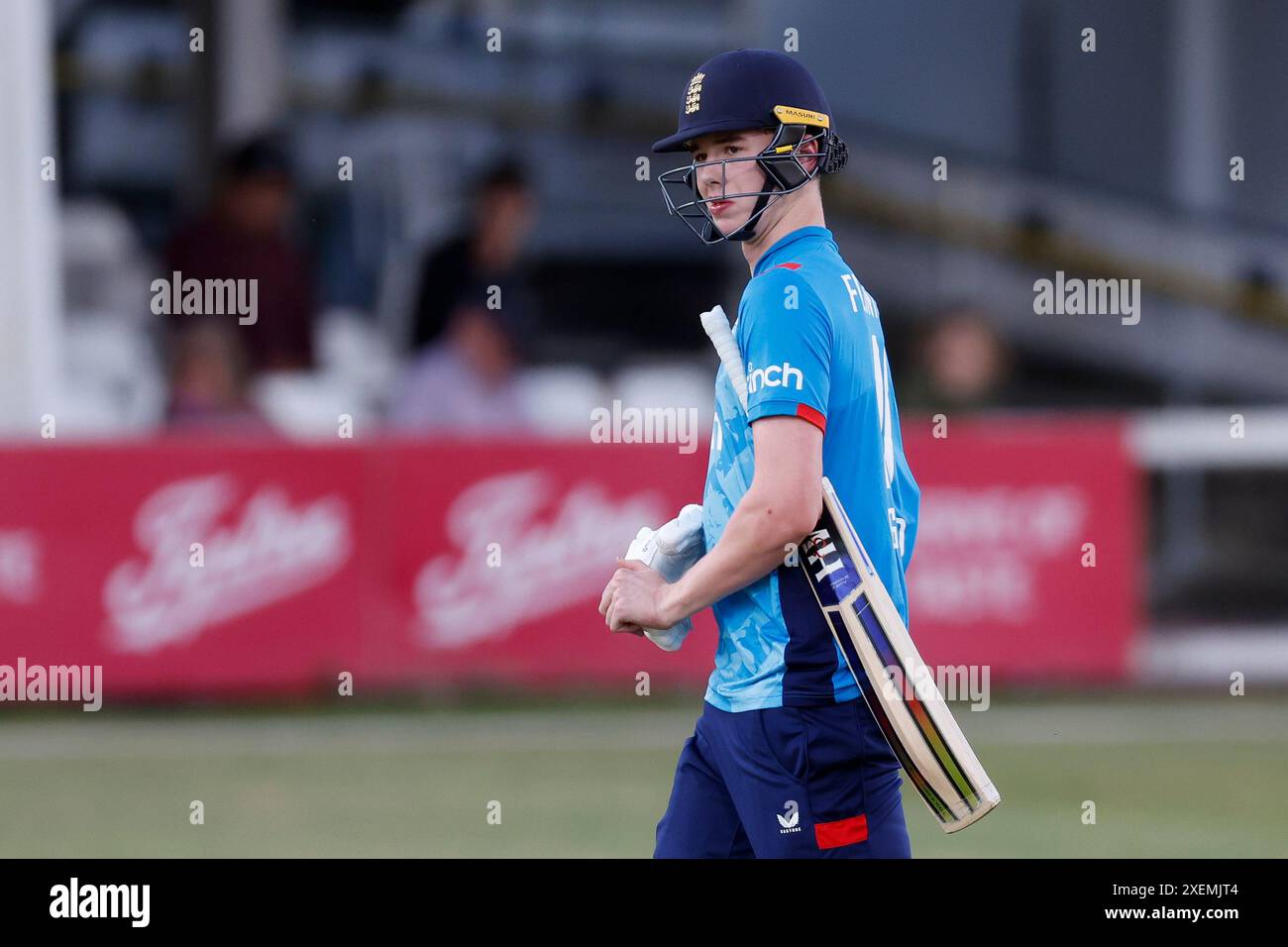 England's Rocky Flintoff reacts after being bowled out by Sri Lanka's Hivin Kenula during the ...