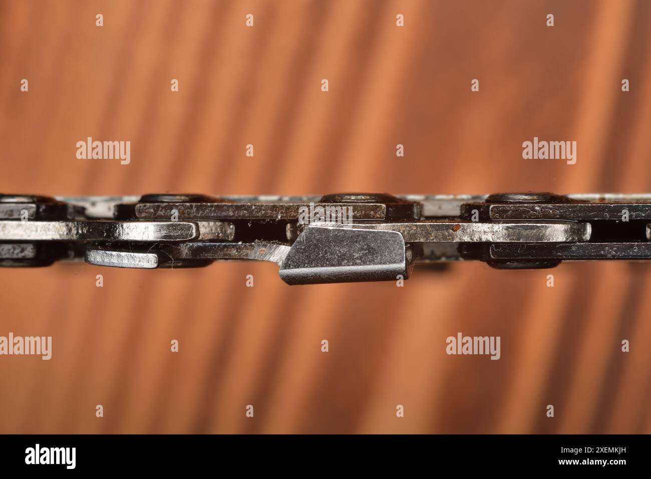 Closeup on chain saw link top view. Chainsaw cutting tooth. Sharp ...